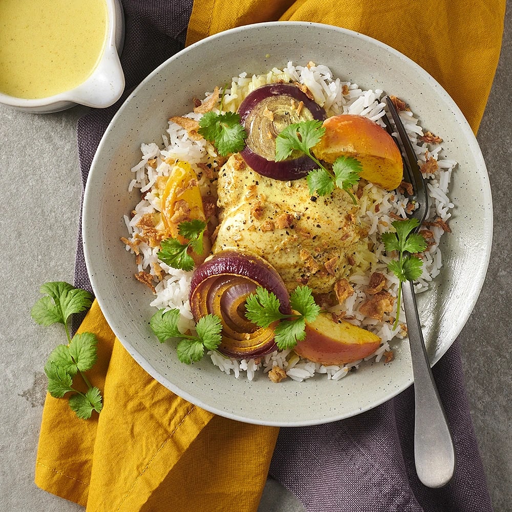 Kyckling i ugn med äpple och curry | Recept ICA.se